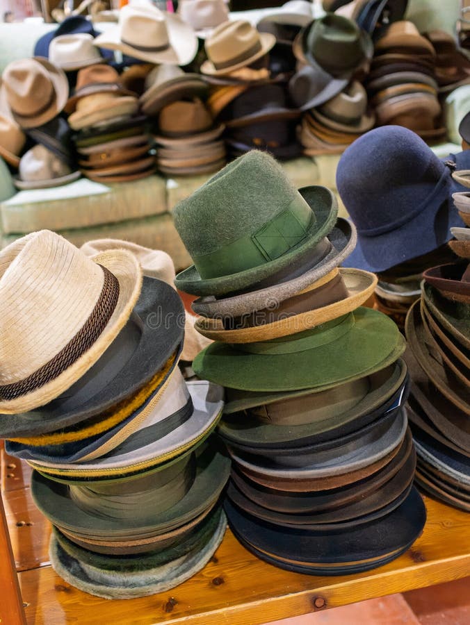 Collection of Various Hats Arranged on Surface in a Market Setting ...