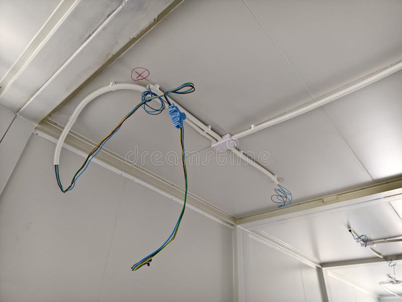 A Collection of Various Wires is Hanging Down from the Ceiling Stock ...