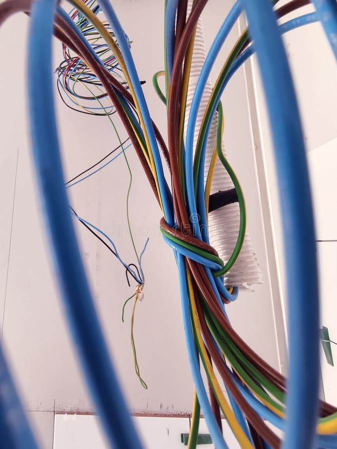 A Collection of Various Wires is Hanging Down from the Ceiling Stock ...