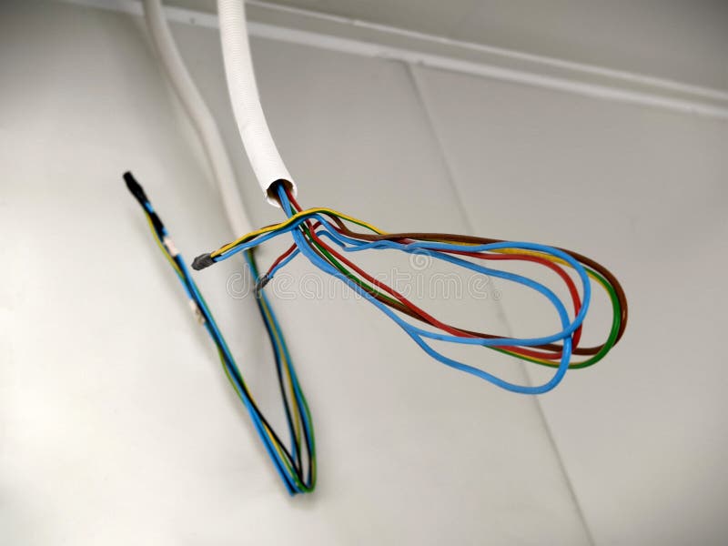 A Collection of Various Wires is Hanging Down from the Ceiling Stock ...
