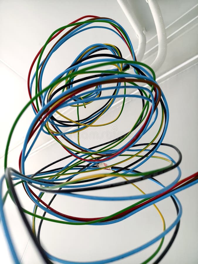A Collection of Various Wires is Hanging Down from the Ceiling Stock ...