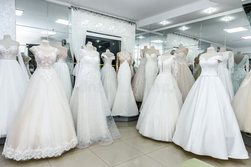 Collection of Wedding Dresses in Showcase of the Shop Stock Photo ...