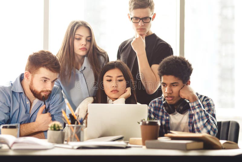 College Classmates Doing Group Project at Library Using Laptop Stock ...