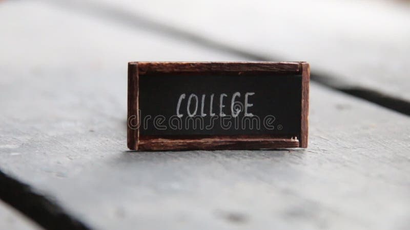 College Education Concept, Tag on an Retro Table Stock Video - Video of ...