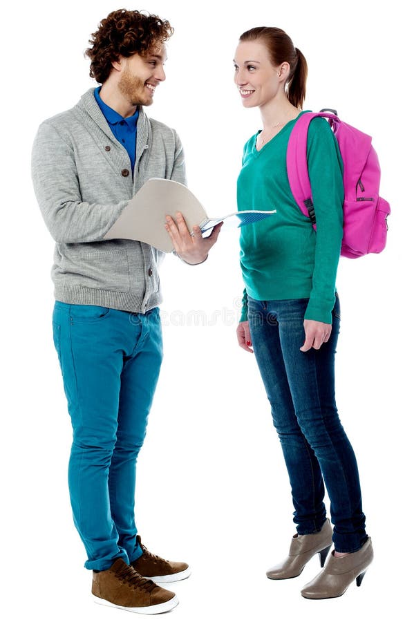 College Friends Discussing Lecture Notes Stock Photo - Image of full ...