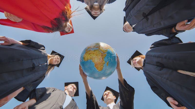 College Graduates Stand in a Circle and Hold a Geographical Globe of ...