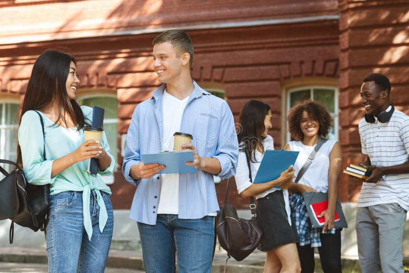 College Life. Joyful Students Chatting Outdoors during Break in Classes ...