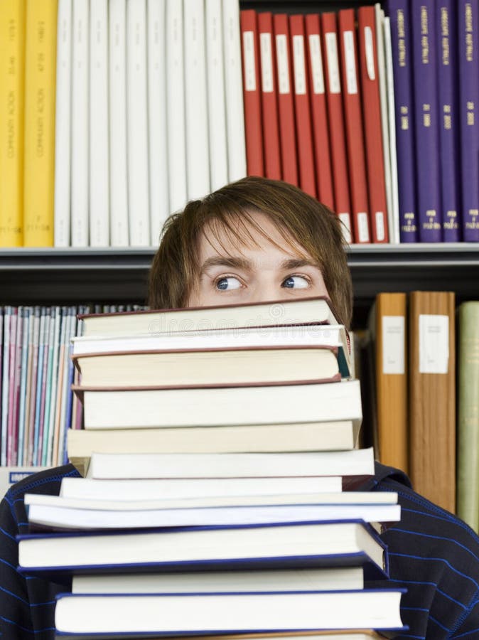 College Student Carrying Stack of Books Stock Image - Image of holding ...