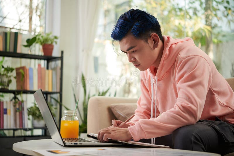 College Student Doing Homework Stock Photo - Image of serious ...
