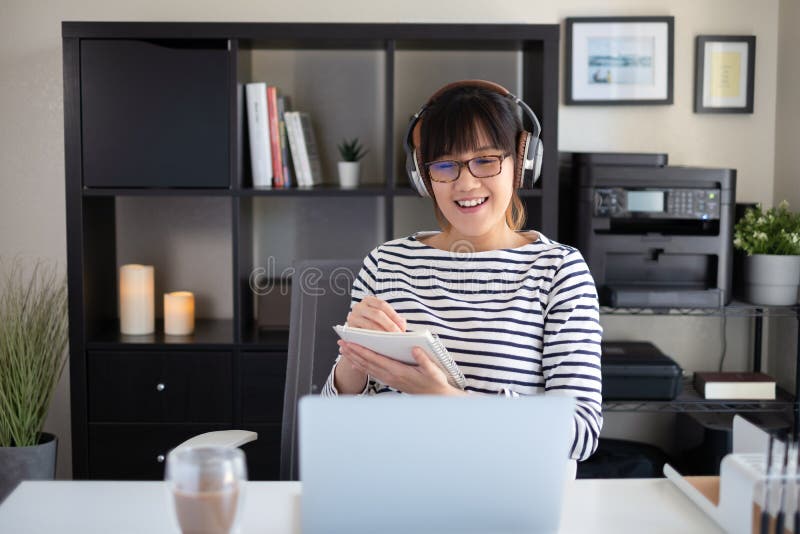 College Student Learning Online Class Looking at the Camera on Computer ...