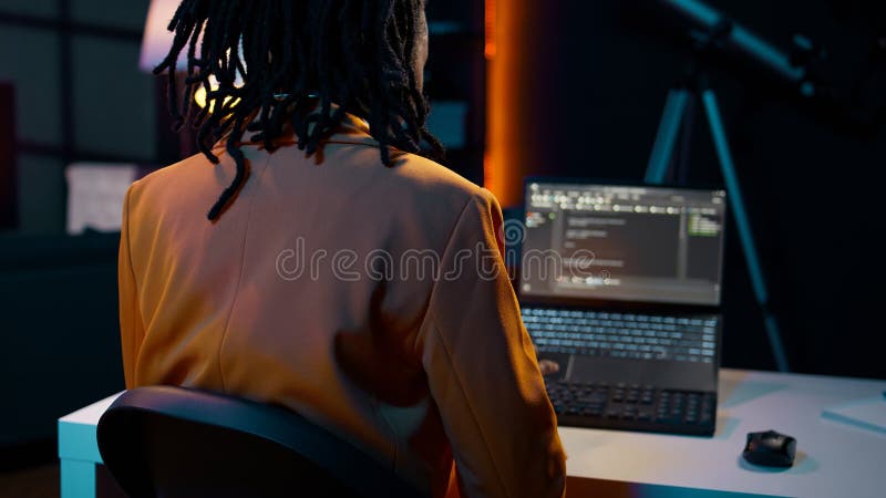 College Student Learning about Outsourcing with Html Script, Stock ...