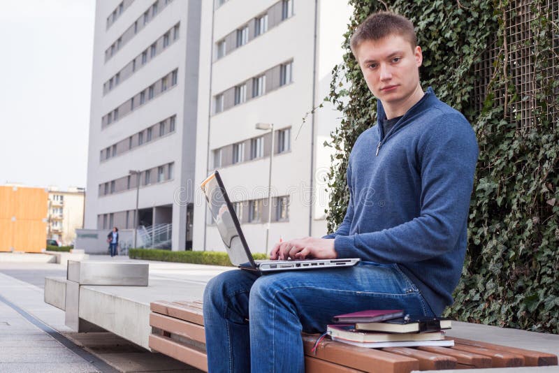 College Student Learning Over Bench Laptop Stock Photos - Free ...
