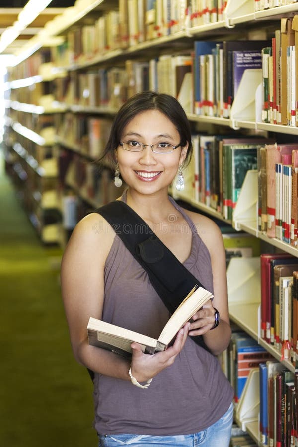 College Student at a Library Stock Photo - Image of campus ...