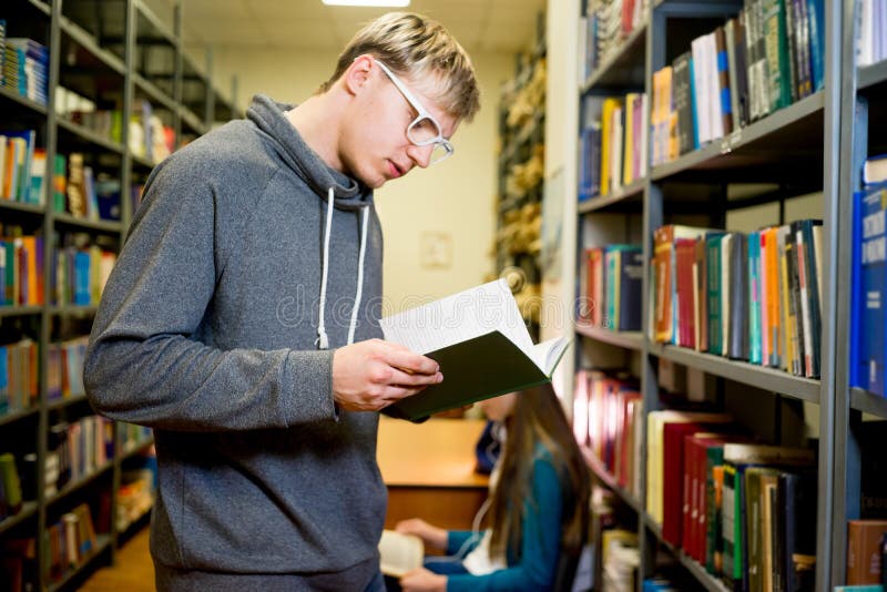 College student in library stock photo. Image of student - 91340140