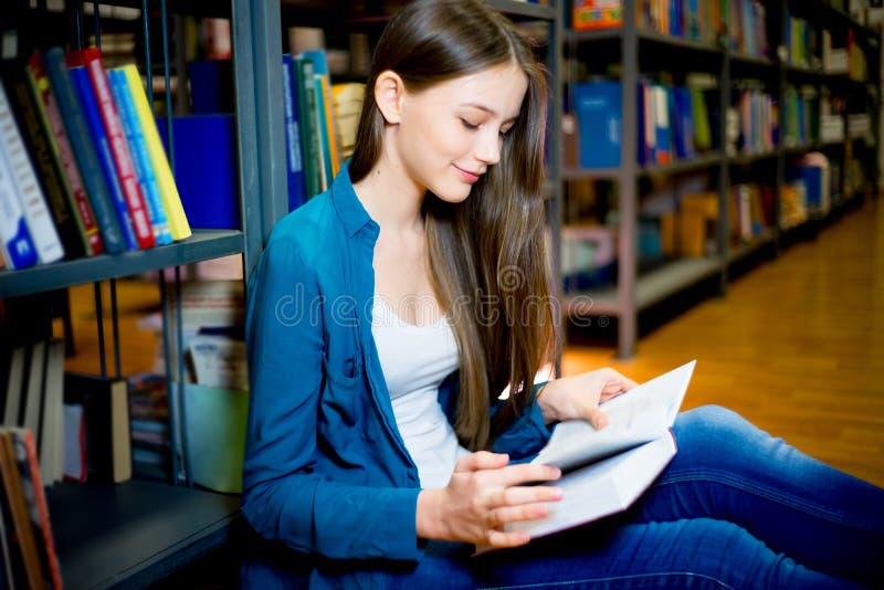 College student in library stock image. Image of indoors - 91340447