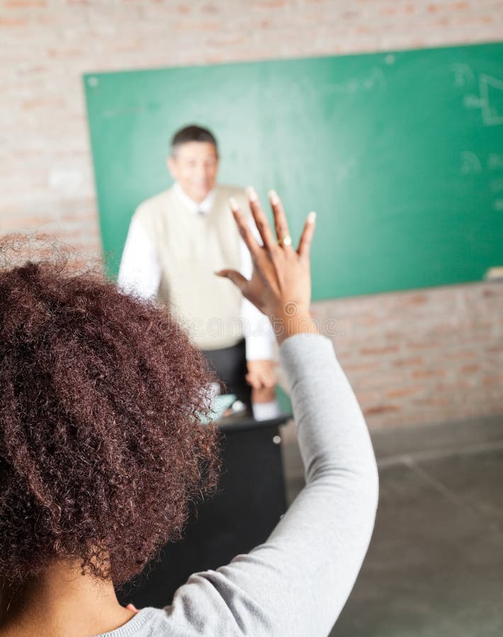 College Student With Hand Raised In Lecture Stock Image - Image of ...
