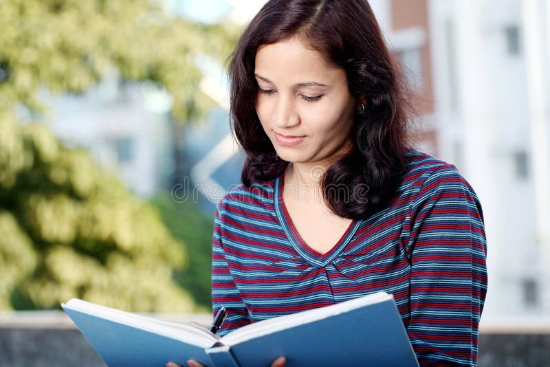 College Student Reading a Book Stock Image - Image of education ...