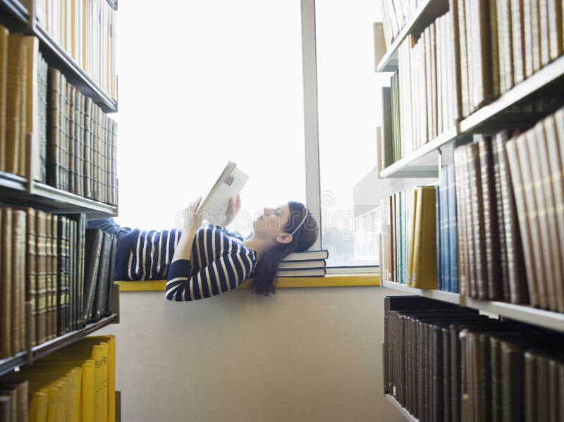 College Student Reading in Library Stock Photo - Image of adult ...