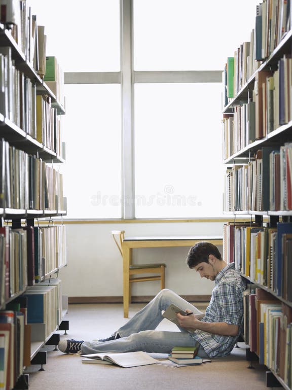 College Student Reading in Library Stock Photo - Image of casual ...