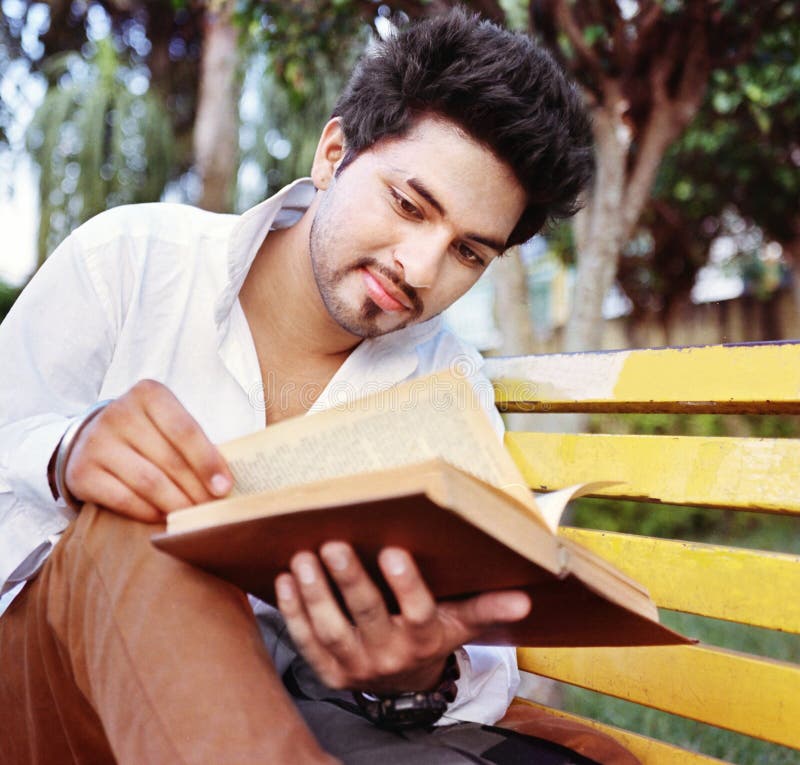 College Student Reading Over Bench. Stock Image - Image of happy ...