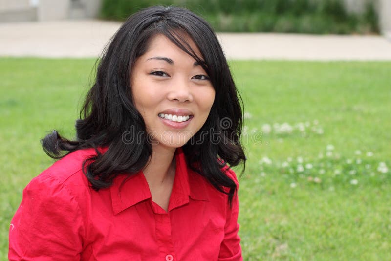 A Beautiful Asian College Student on a University Campus Stock Photo ...