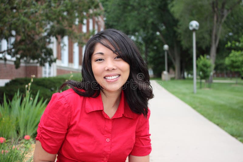 A Beautiful Asian College Student on a University Campus Stock Image ...
