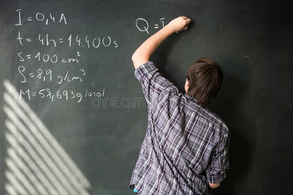 College Student Solving a Math Problem Stock Photo - Image of male ...