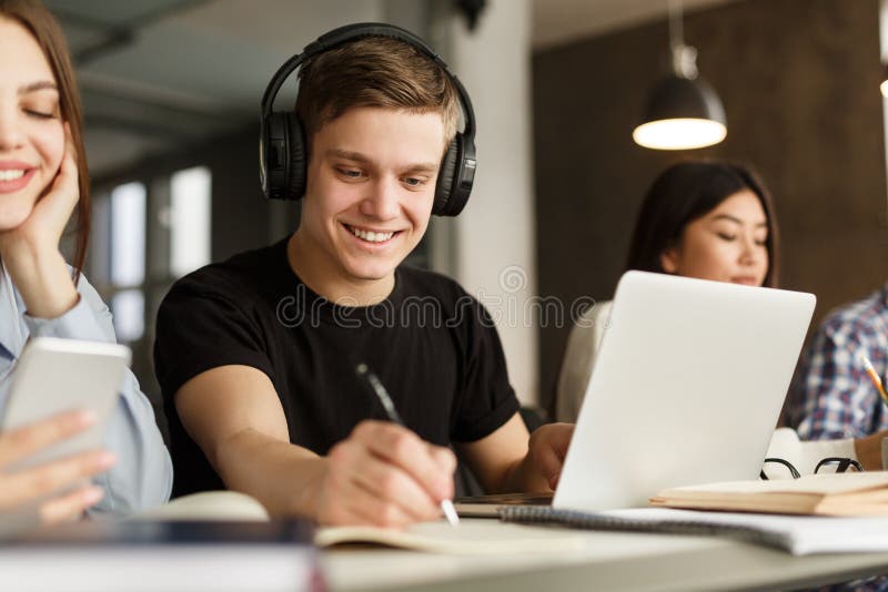 College Student Taking Notes, Doing Assignments in Library Stock Image ...