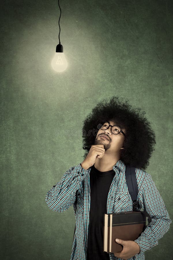 College Student Thinking Solution with Bulb Stock Photo - Image of ...