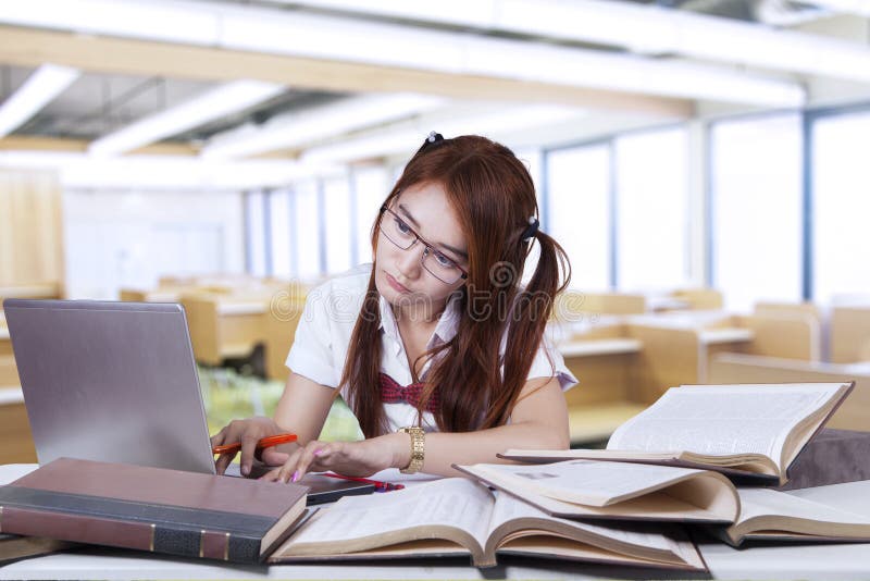 College Student Typing on Laptop in Class Stock Image - Image of online ...