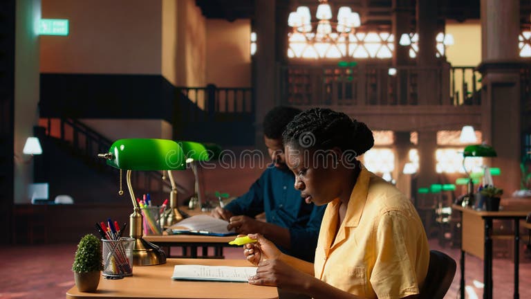 College Student Underlining Relevant Phrases from the Class Notes Stock ...