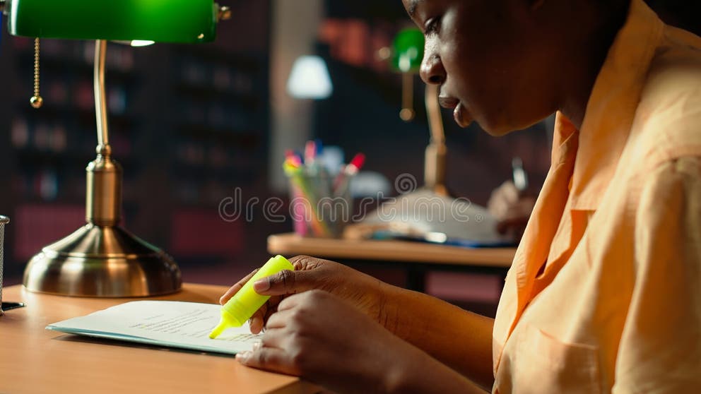 College Student Underlining Relevant Phrases from the Class Notes Stock ...