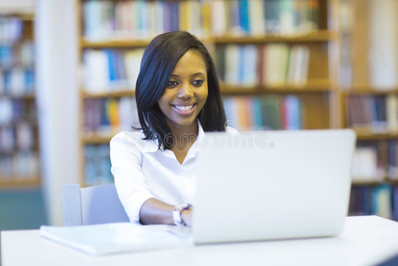 7,827 Happy Female Student Laptop Library Stock Photos - Free & Royalty ...