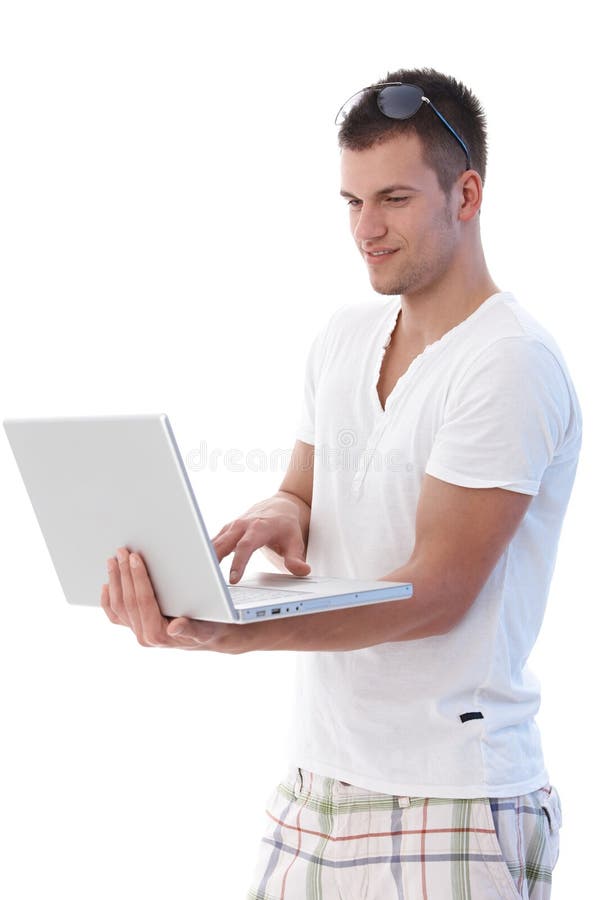 College Student Using Laptop Smiling Stock Image - Image of browsing ...