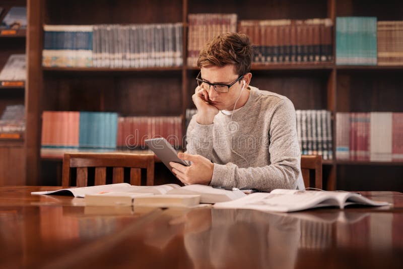 College Student Using Tablet Pc in Library Stock Photo - Image of ...