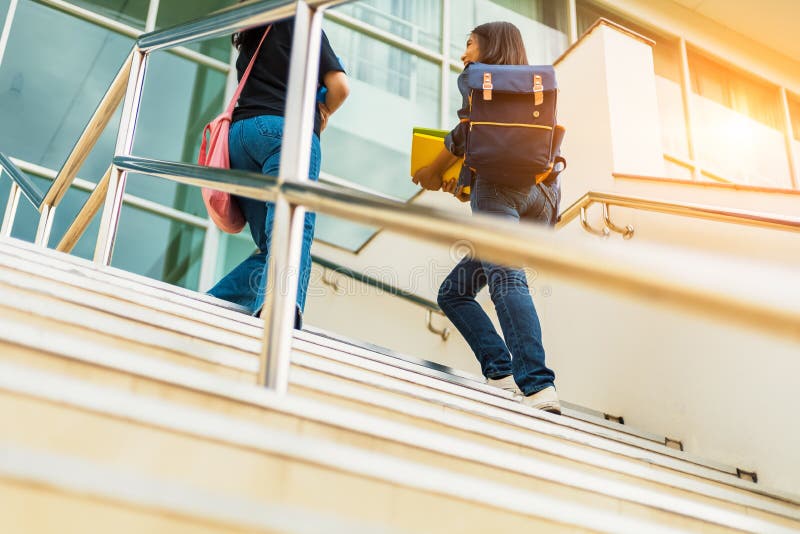 College Student Walking Up the Staircase Stock Image - Image of climb ...