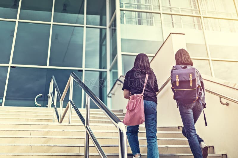 College Student Walking Up the Staircase Stock Photo - Image of office ...