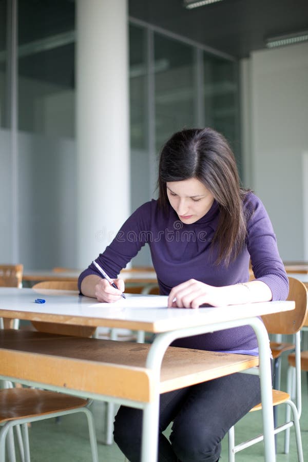 College Student Working in a Classroom Stock Image - Image of confident ...