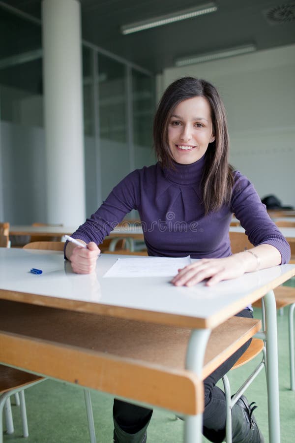 College Student Working in a Classroom Stock Image - Image of friends ...