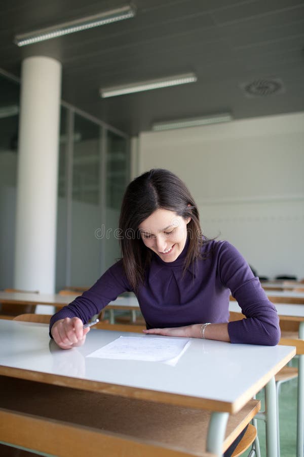 College Student Working in a Classroom Stock Image - Image of confident ...