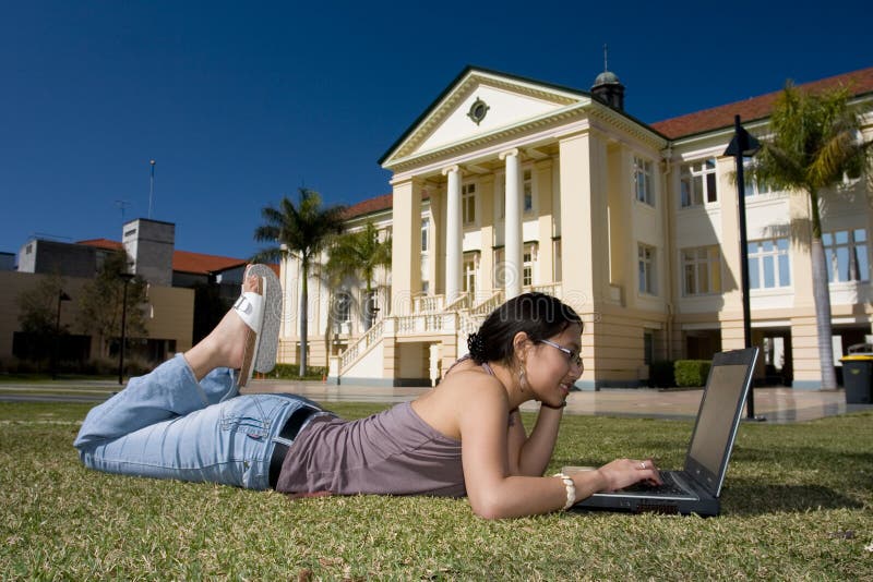 College Student Working with Laptop Stock Image - Image of building ...