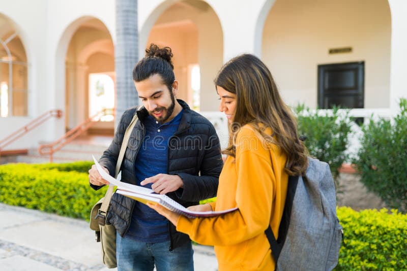 College Students Checking the Class Notes Stock Image - Image of ...
