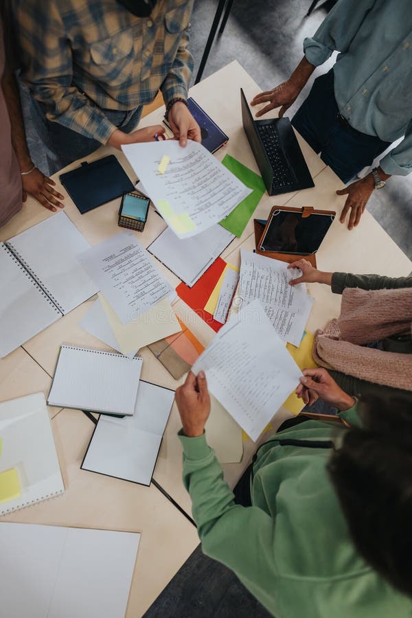 College Students Collaborating with Elderly Professor in a Modern ...