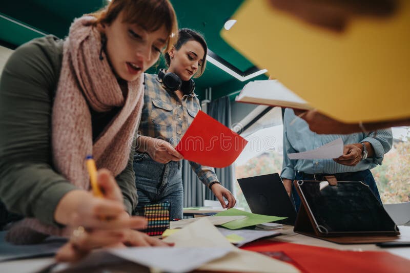 College Students Collaborating with Elderly Professor in Modern ...