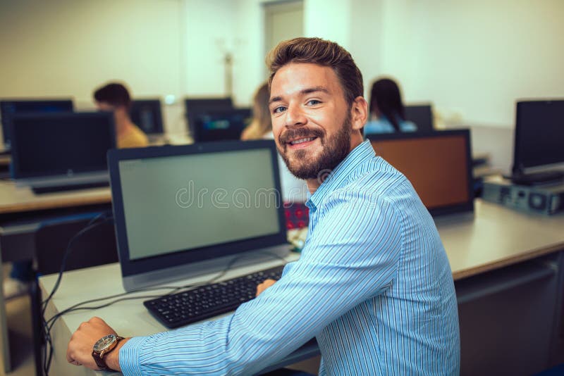 College Students in a Computer Lab Stock Image - Image of looking, desk ...