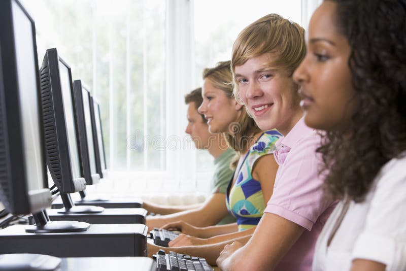 College Students in a Computer Lab Stock Photo - Image of looking ...