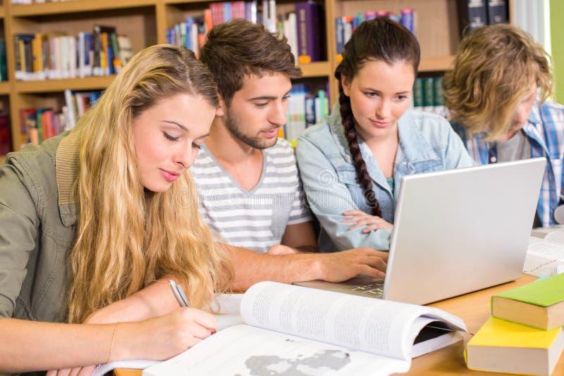 College Students Doing Homework in Library Stock Photo - Image of front ...