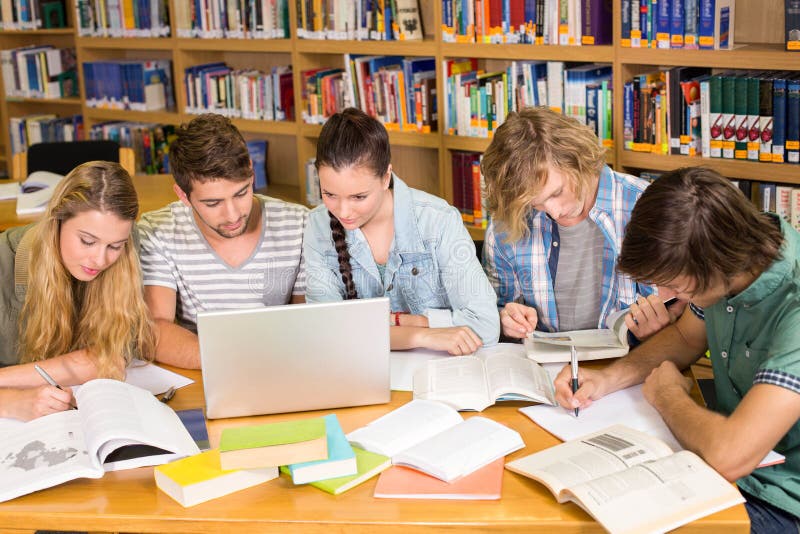 College Students Doing Homework in Library Stock Photo - Image of ...