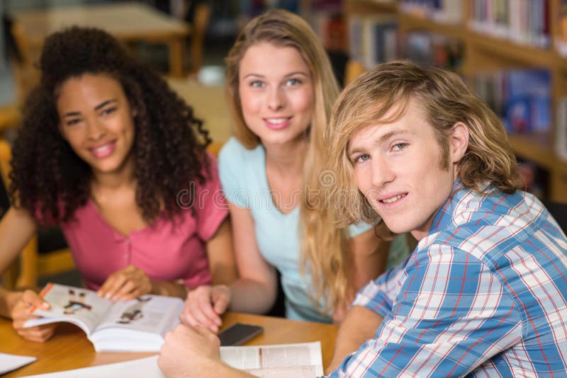 College Students Doing Homework in Library Stock Photo - Image of ...