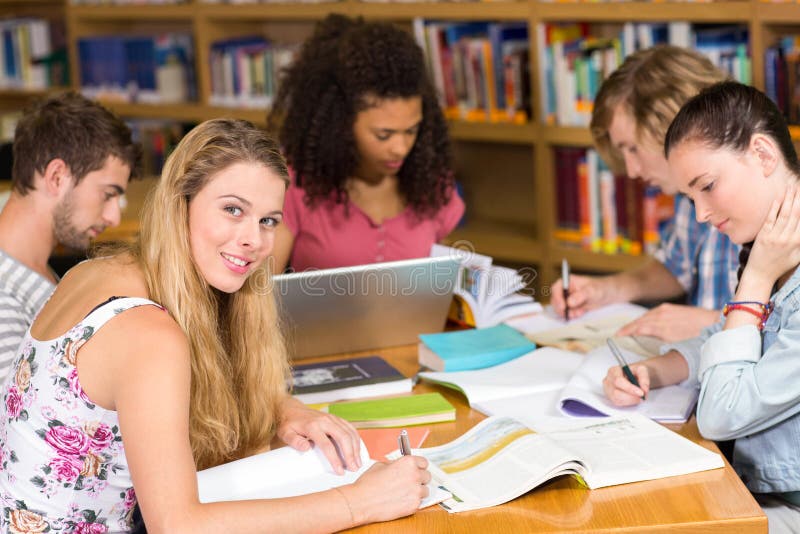 College Students Doing Homework in Library Stock Image - Image of ...